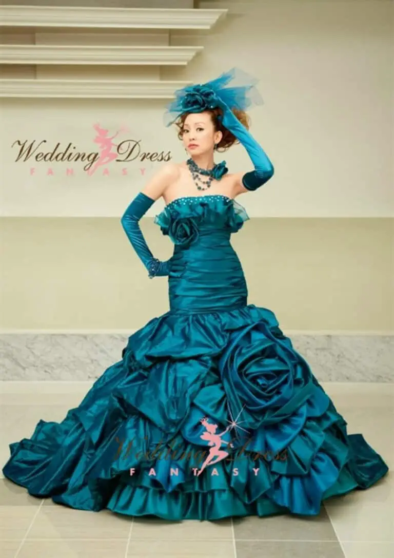16 Dreamy Peacock Wedding Dress Ideas (Cruelty-free) - Magical Day Weddings